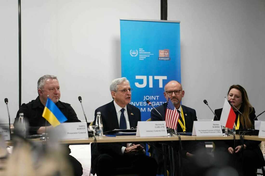 Garland says Ukrainian victims of war with Russia deserve justice : NPR