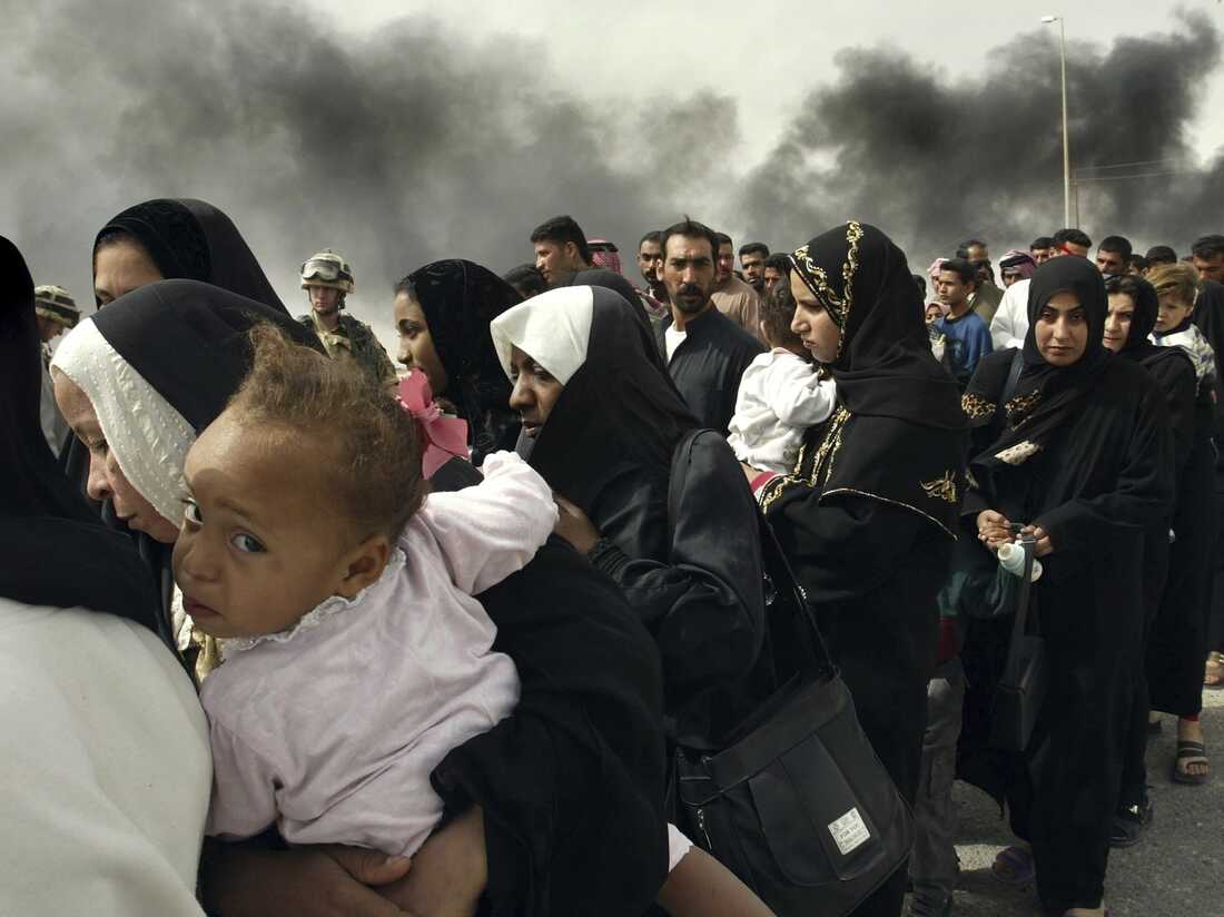 Photographs of the Iraq War 20 years later : The Picture Show : NPR