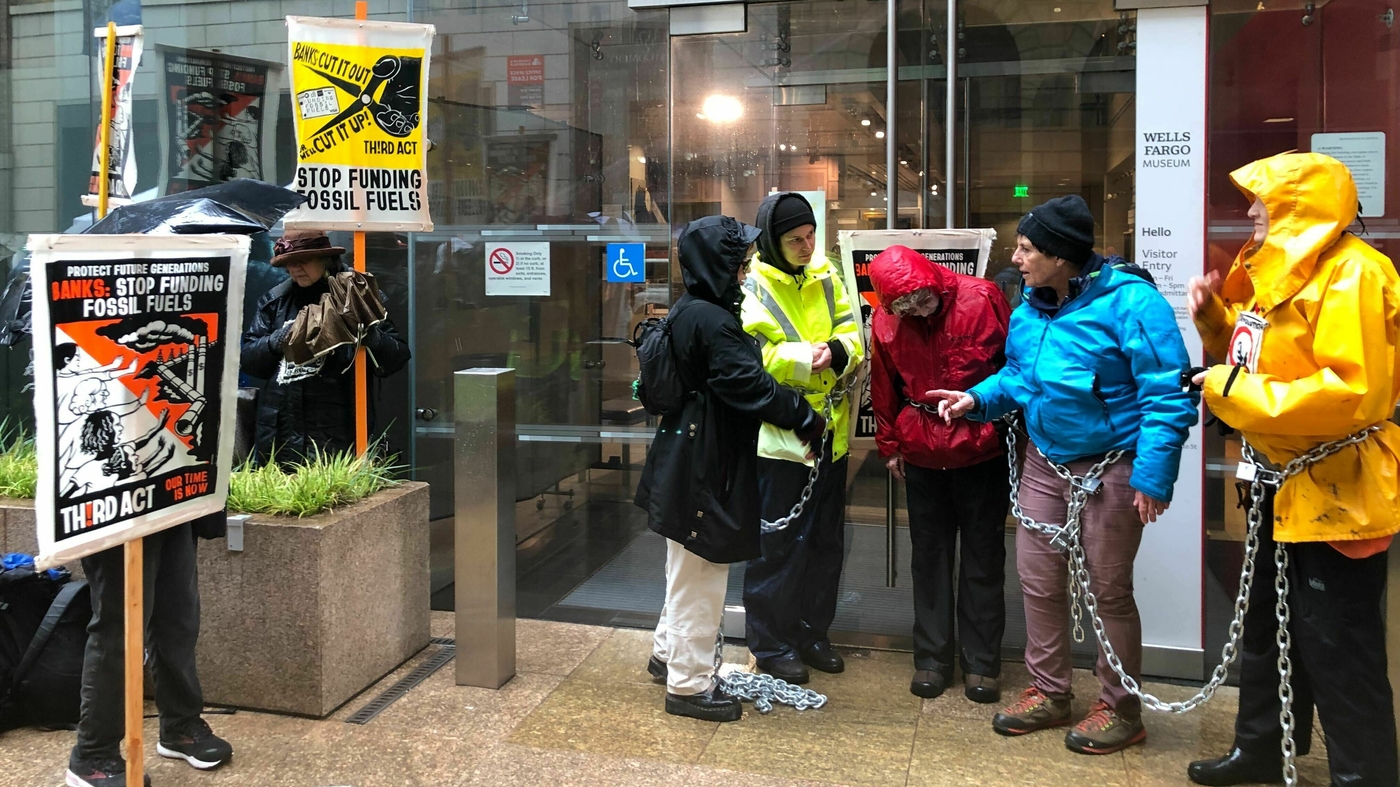 Climate protesters call on banks to divest from fossil fuels : NPR