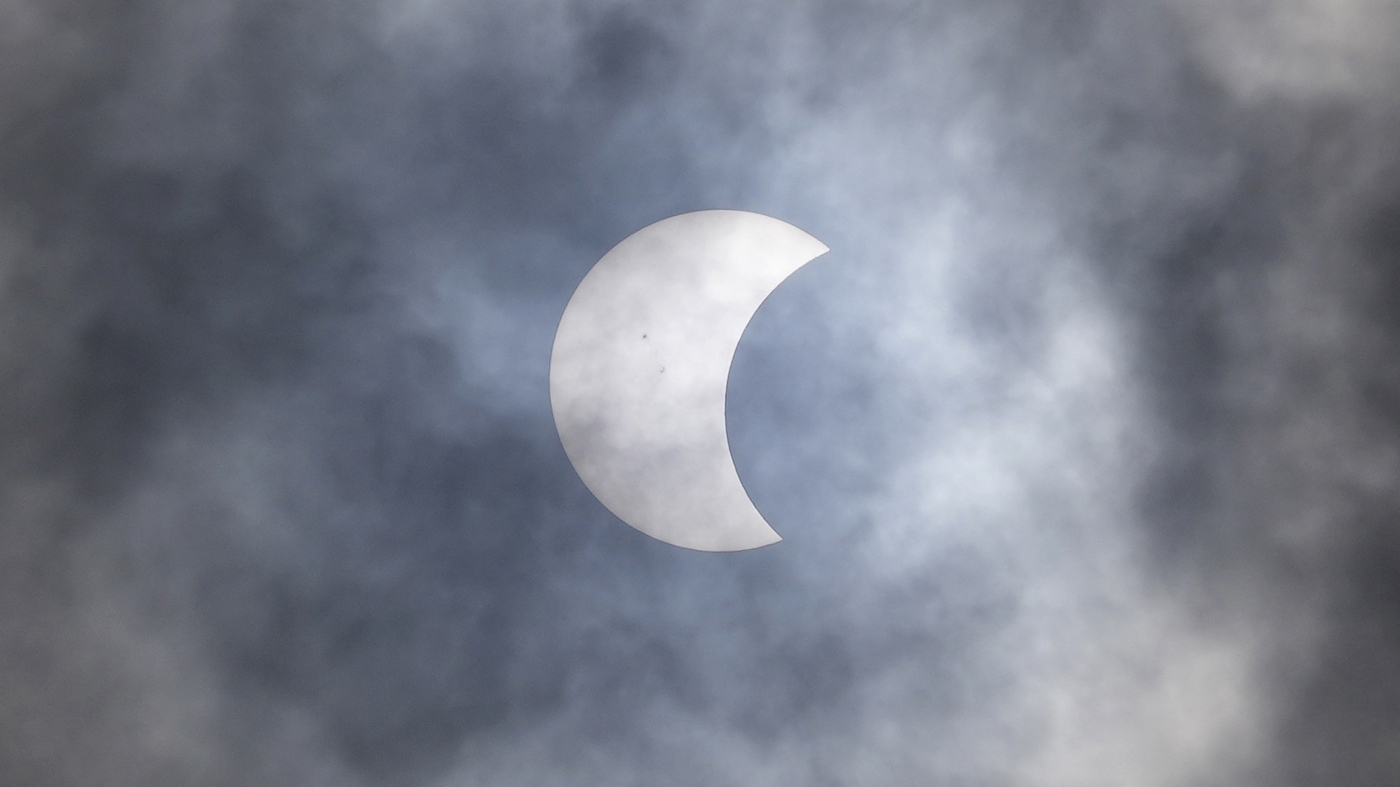 A rare hybrid solar eclipse wows viewers in Australia and Indonesia : NPR