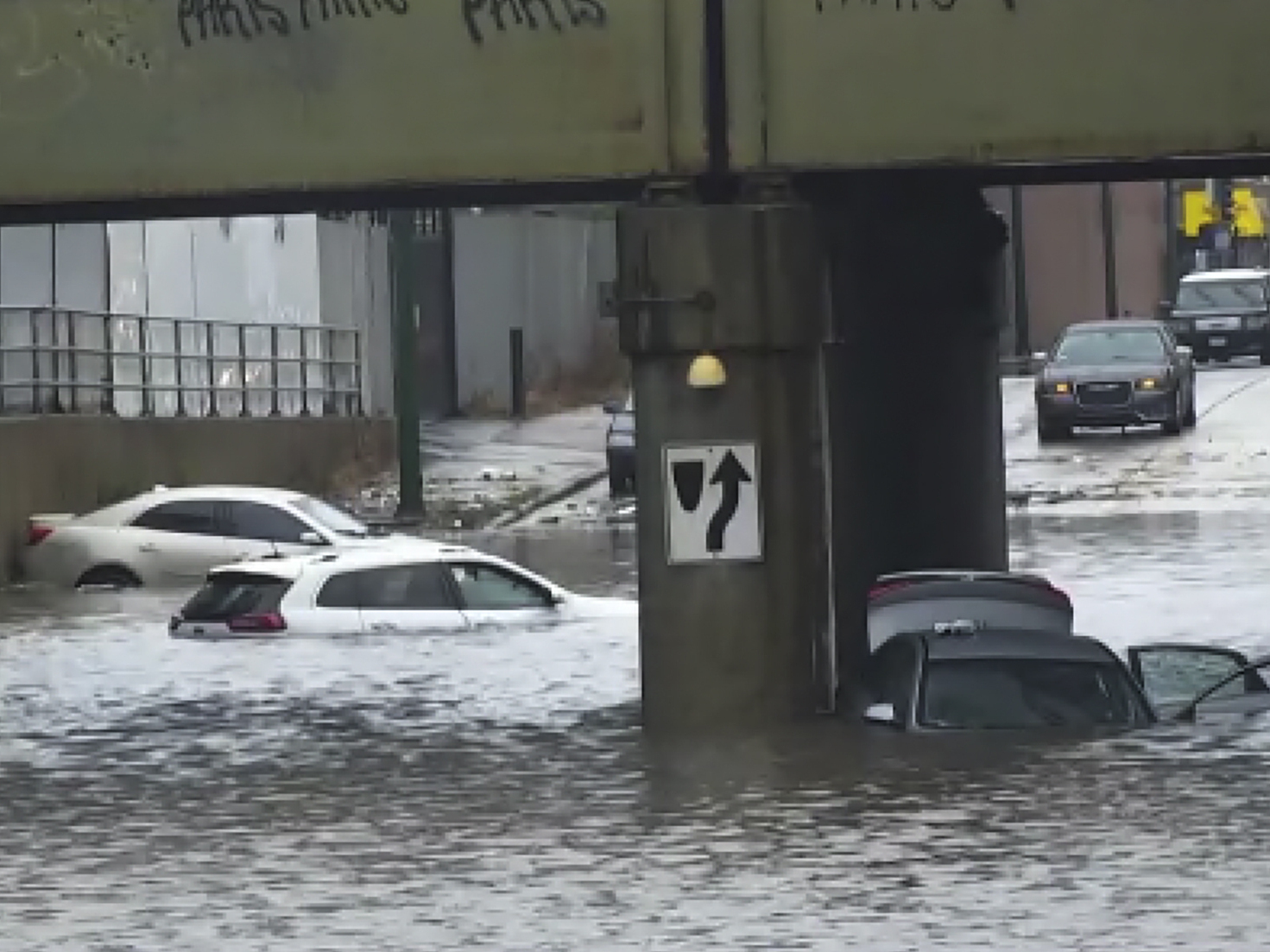 Heavy rains flood Chicago roads and force a downtown street race to be ...