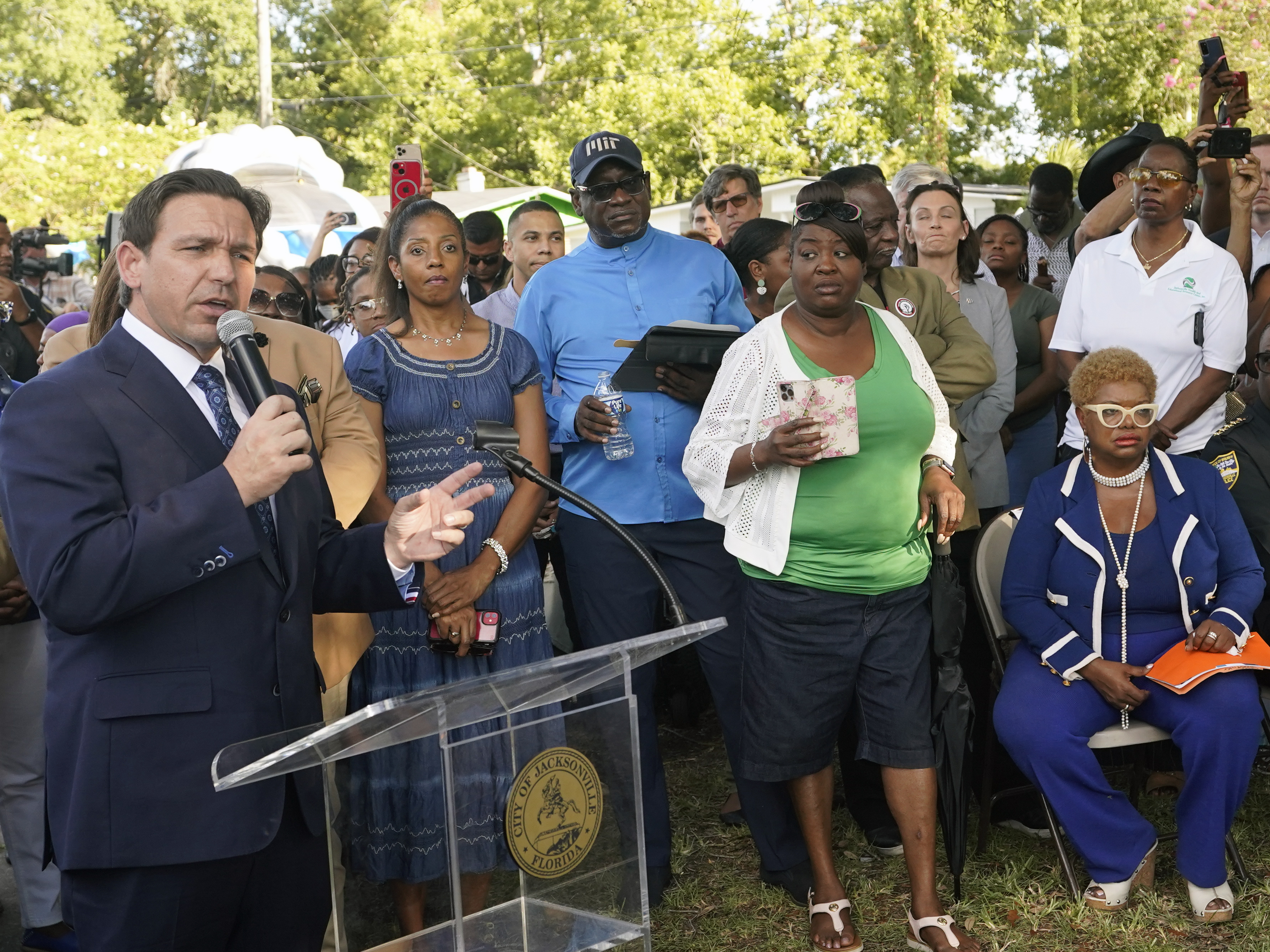 'You're not welcome here!' DeSantis booed at vigil for Jacksonville ...