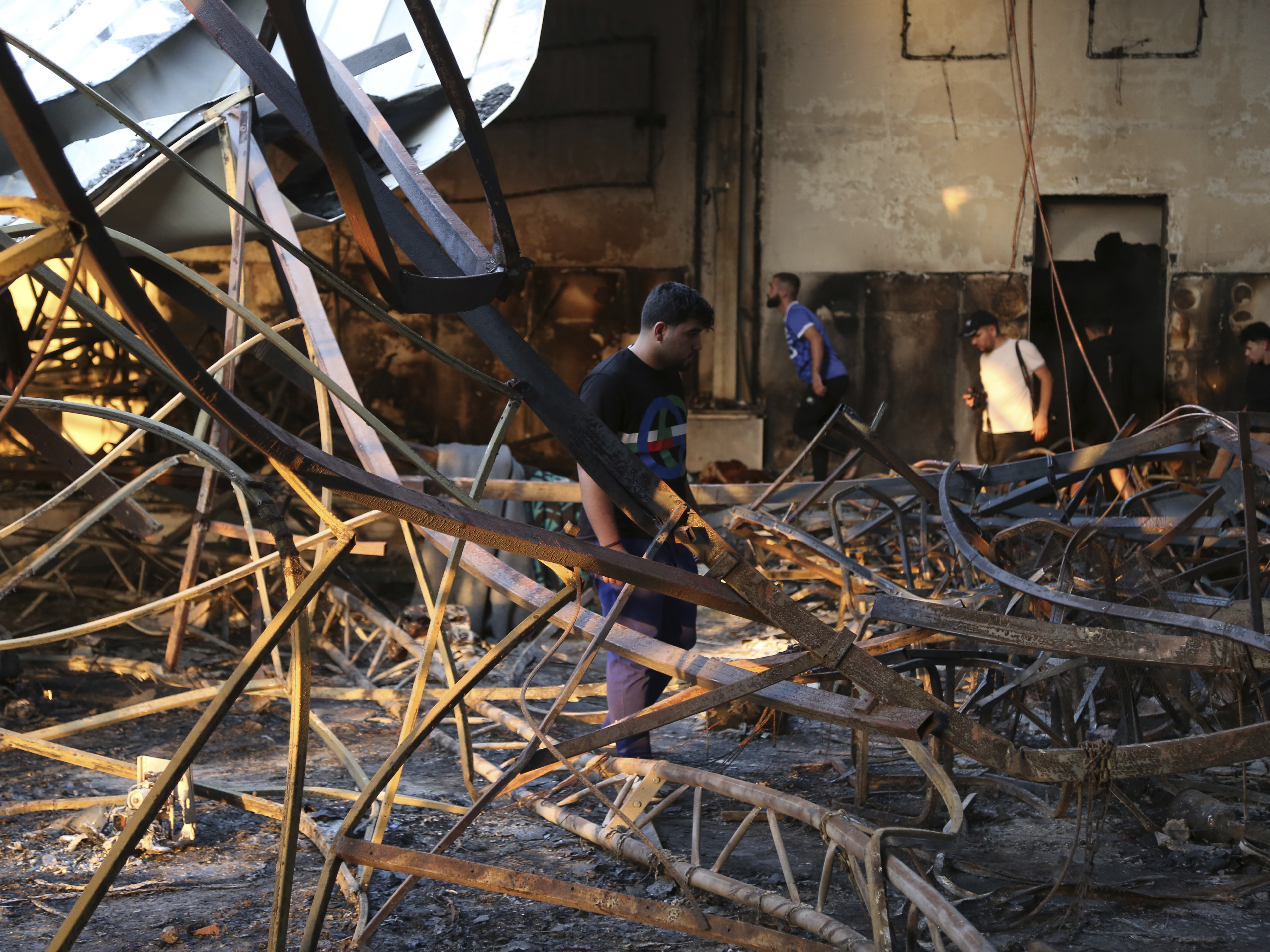A fire at a wedding hall in Iraq kills at least 100 people and injures ...