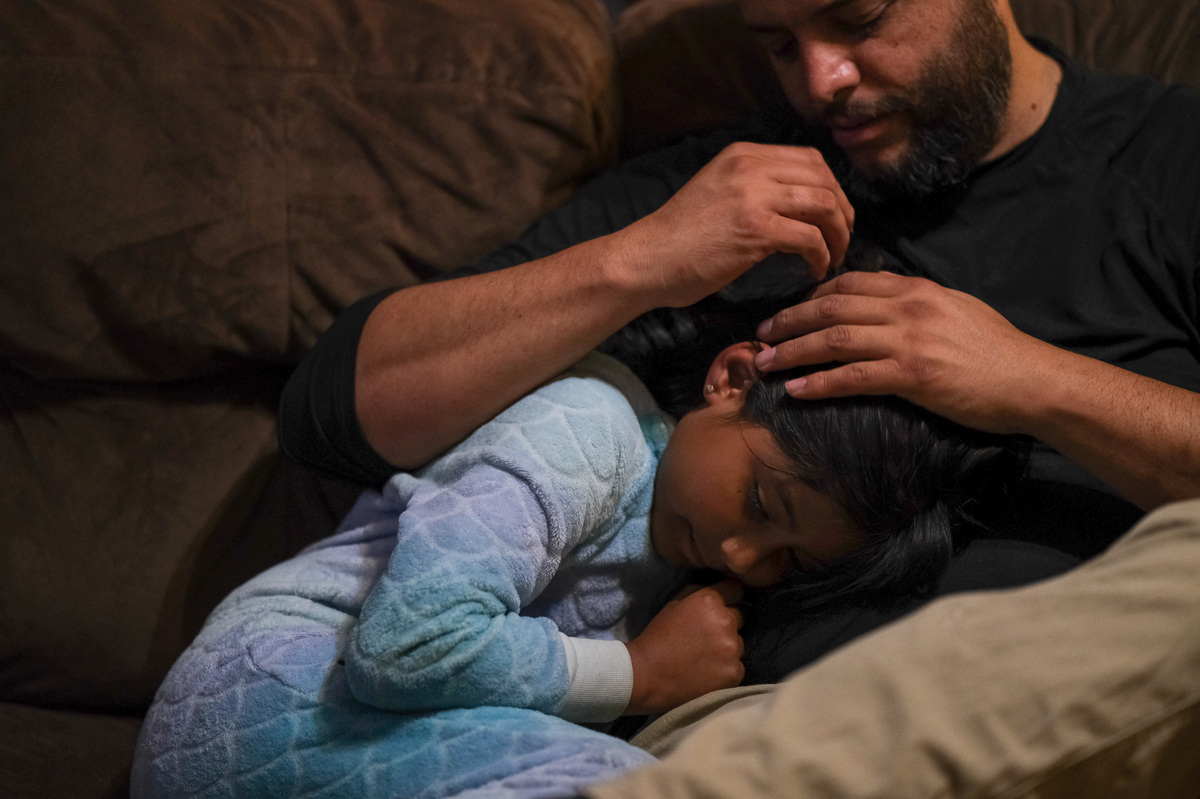 Parents can calm grumpy kids with a soothing caress : Goats and Soda : NPR