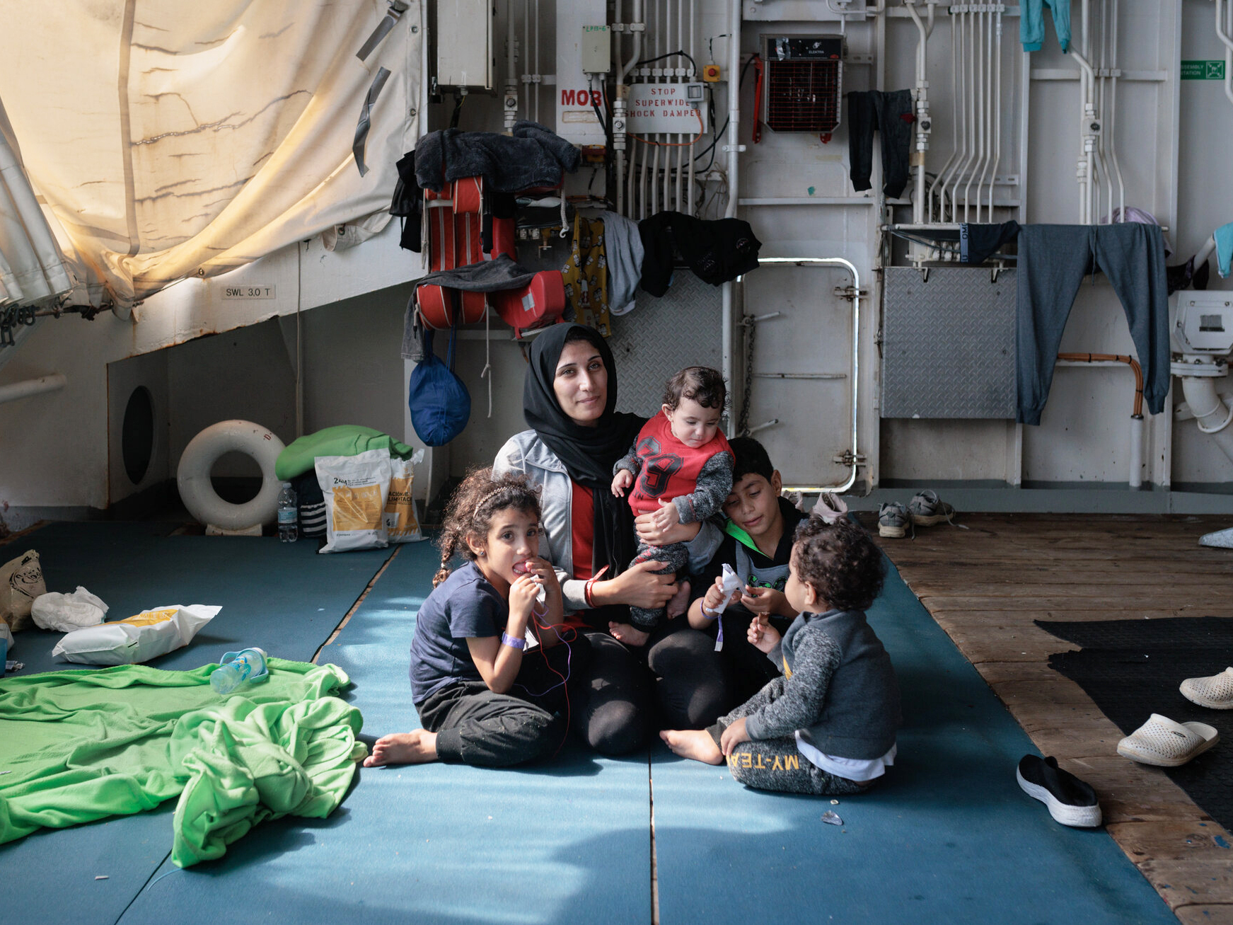 A rescue ship saved them from the sea. Now these migrants find a tough ...