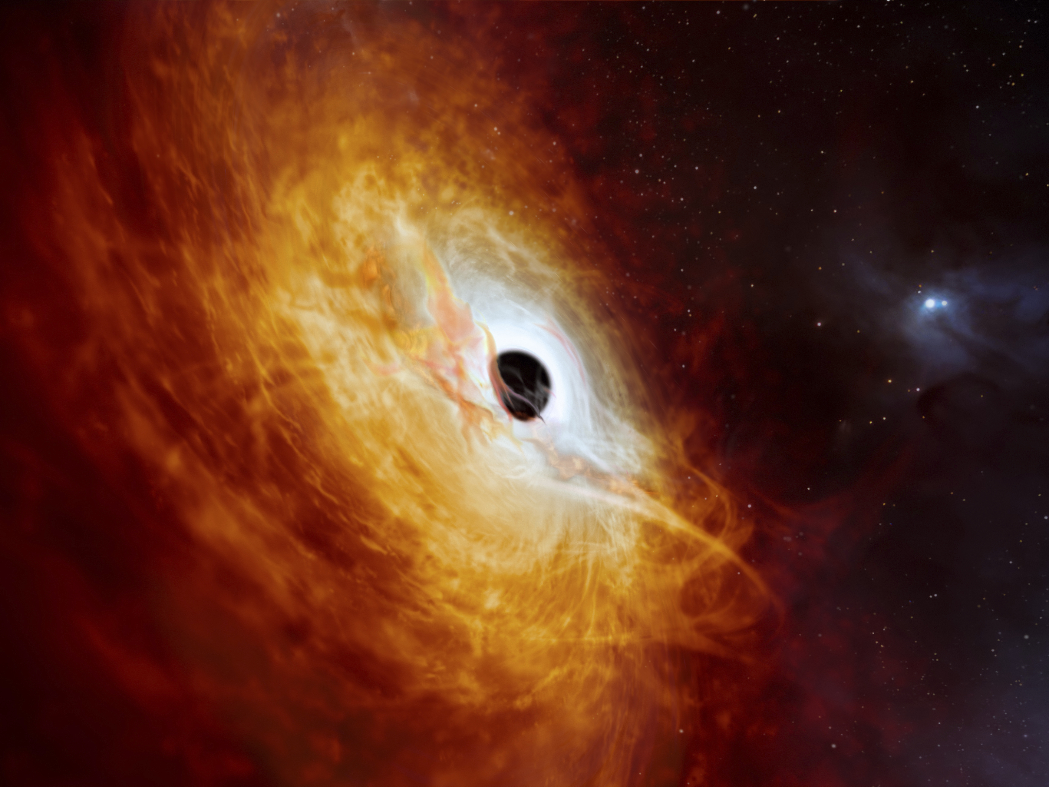 Scientists have found a black hole so large it eats the equivalent of ...