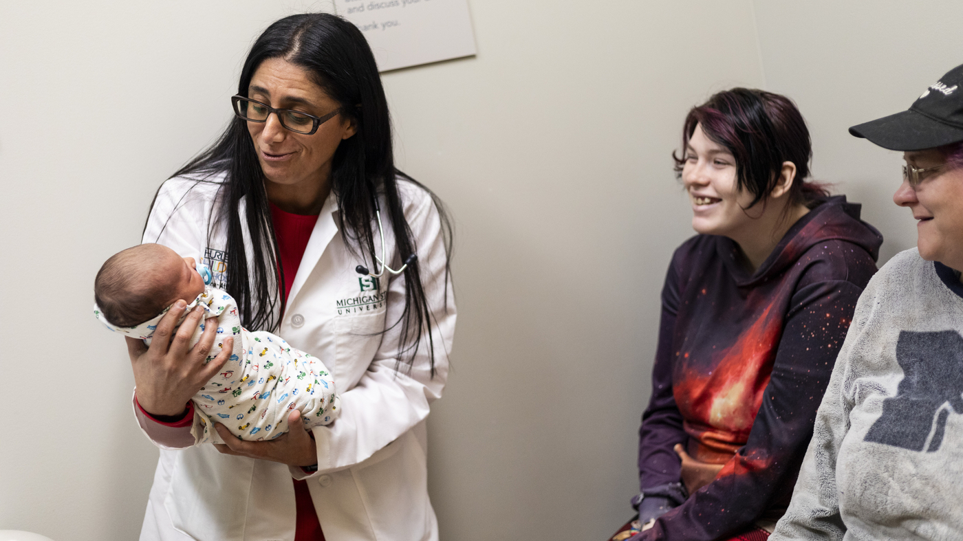 All new moms in Flint, Mich., now get cash aid to tackle poverty : NPR