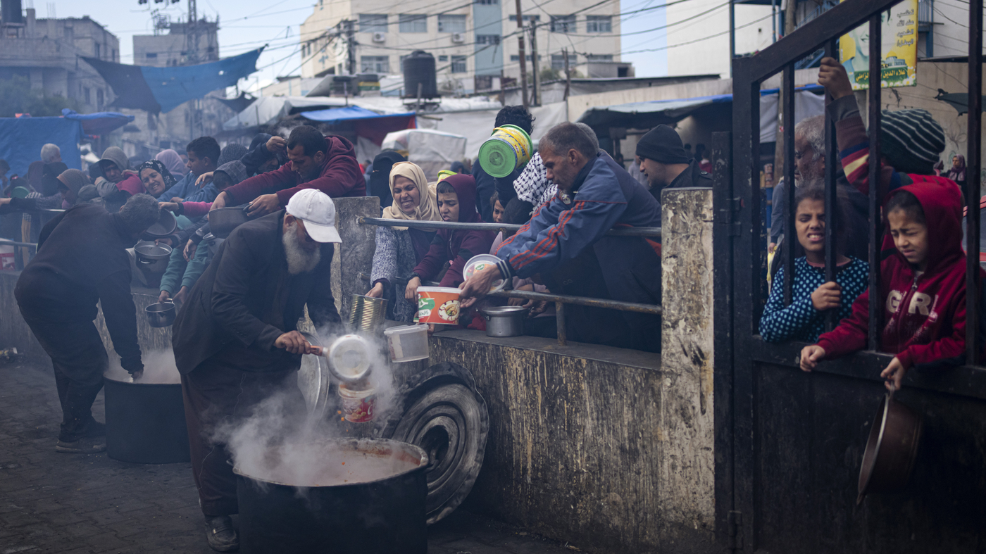 Gaza clans and tribes are being asked to distribute aid : NPR