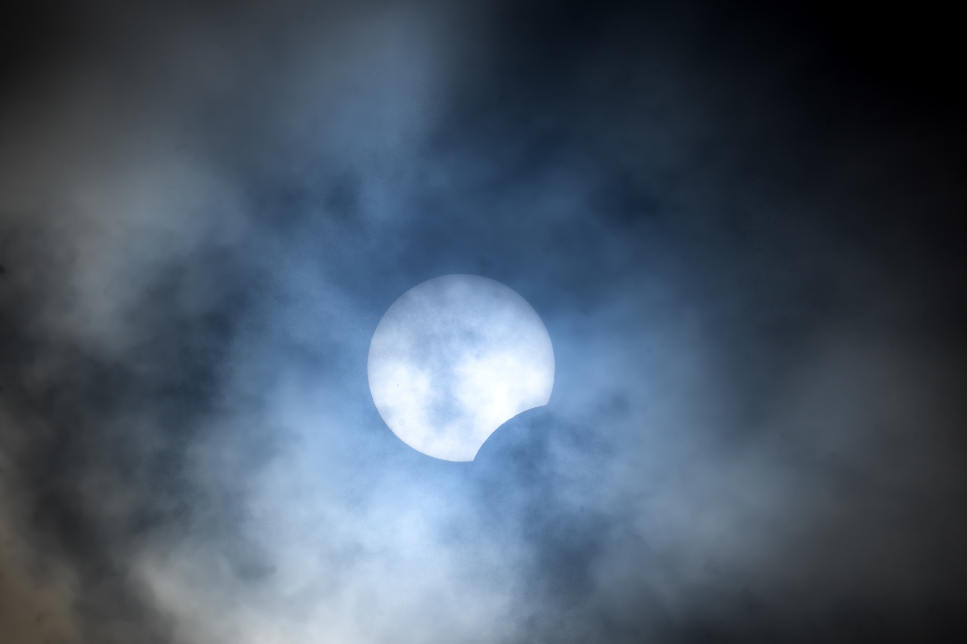 A rare solar eclipse darkened skies and dazzled viewers across the U.S ...