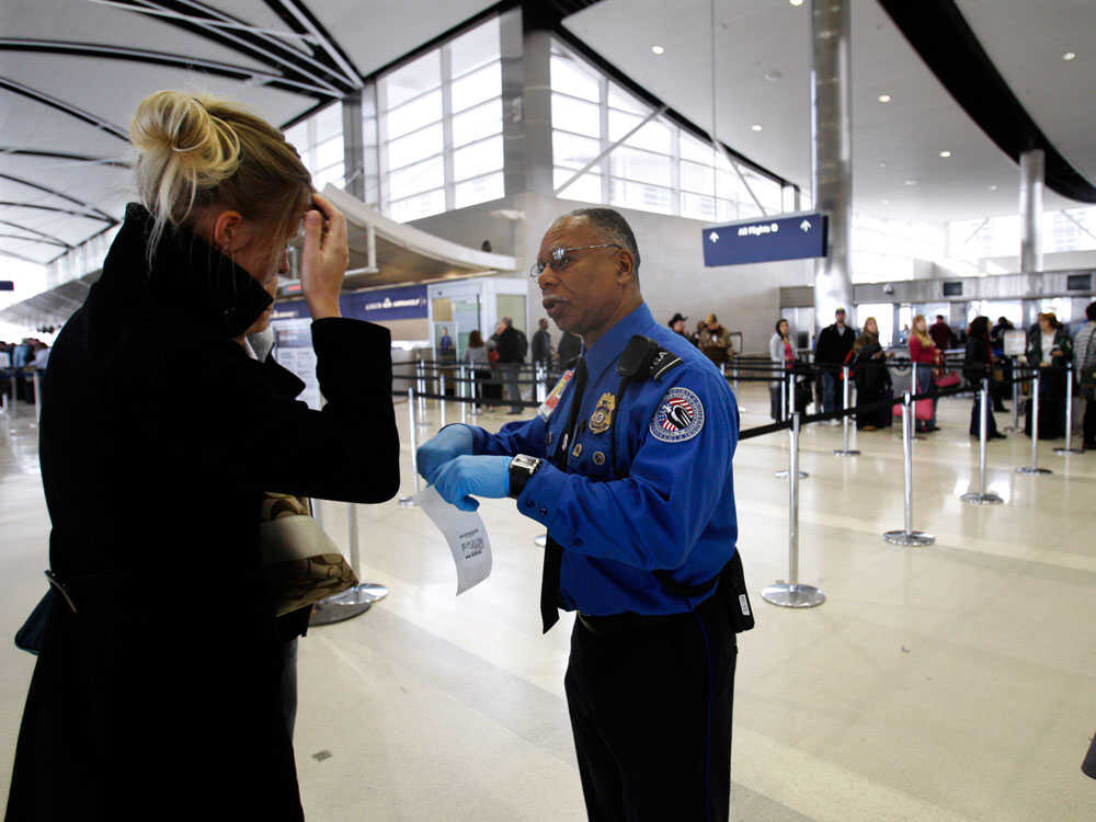 Airline Passengers Calm As Security Tightened : NPR