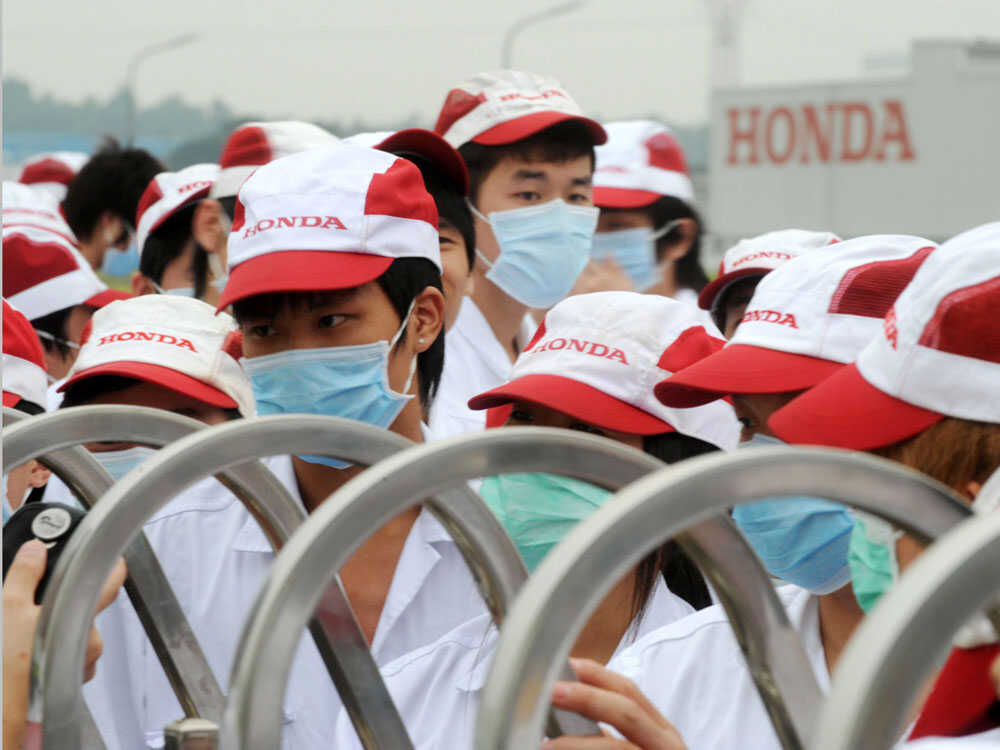 Emboldened Chinese Workers Press For Change : NPR