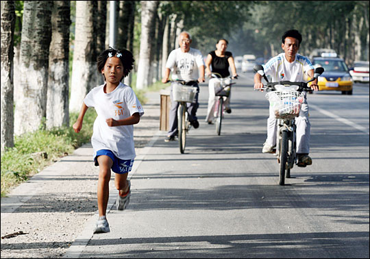 Tiny Runner Completes Epic Journey in China : NPR